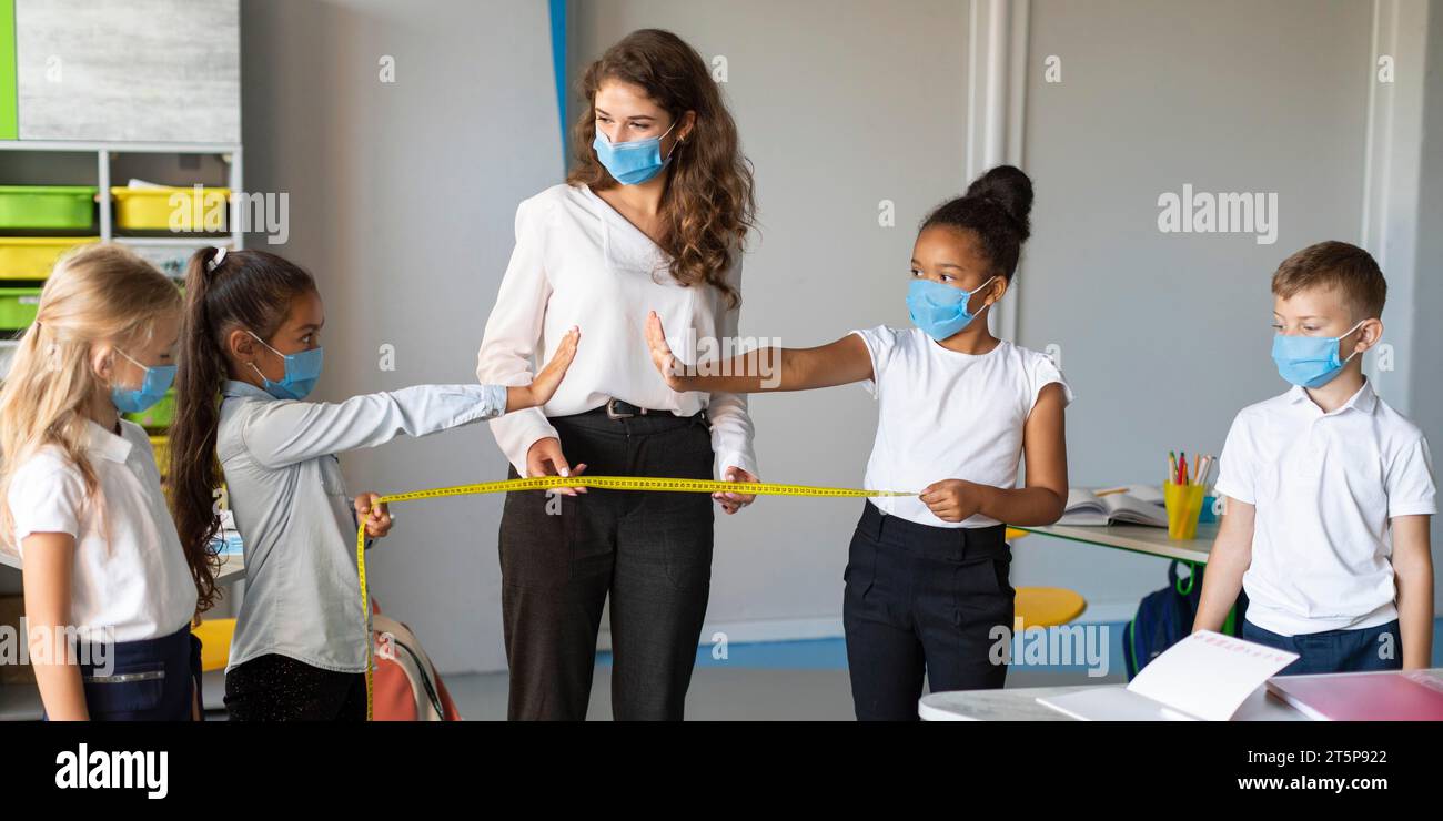 Kids learning about pandemic rules Stock Photo - Alamy