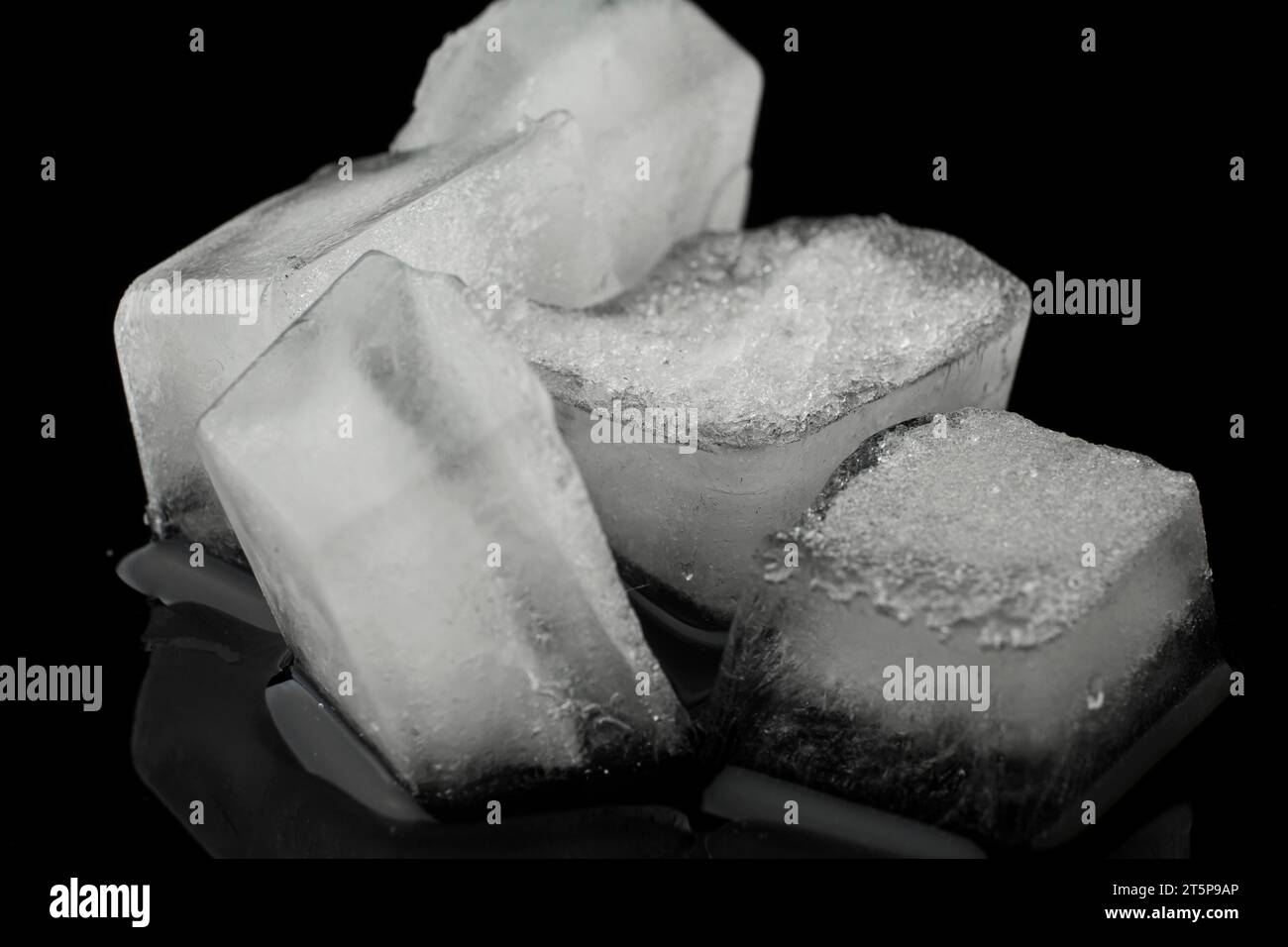 Pile ice cubes front view Stock Photo - Alamy