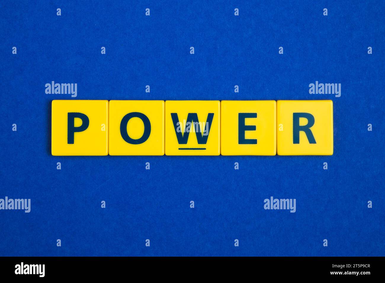 Power word yellow tiles Stock Photo - Alamy