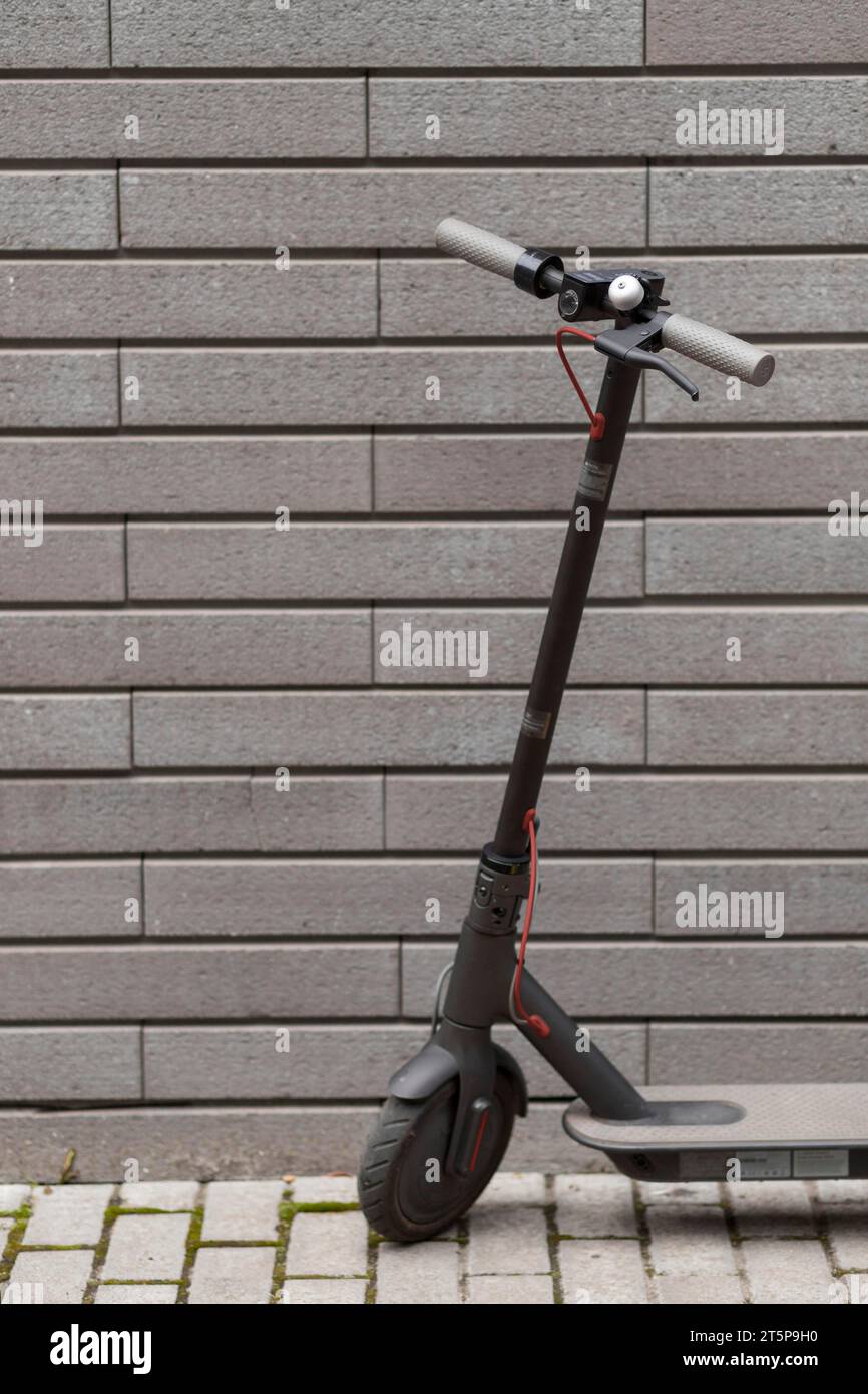 Side view scooter outdoors Stock Photo - Alamy