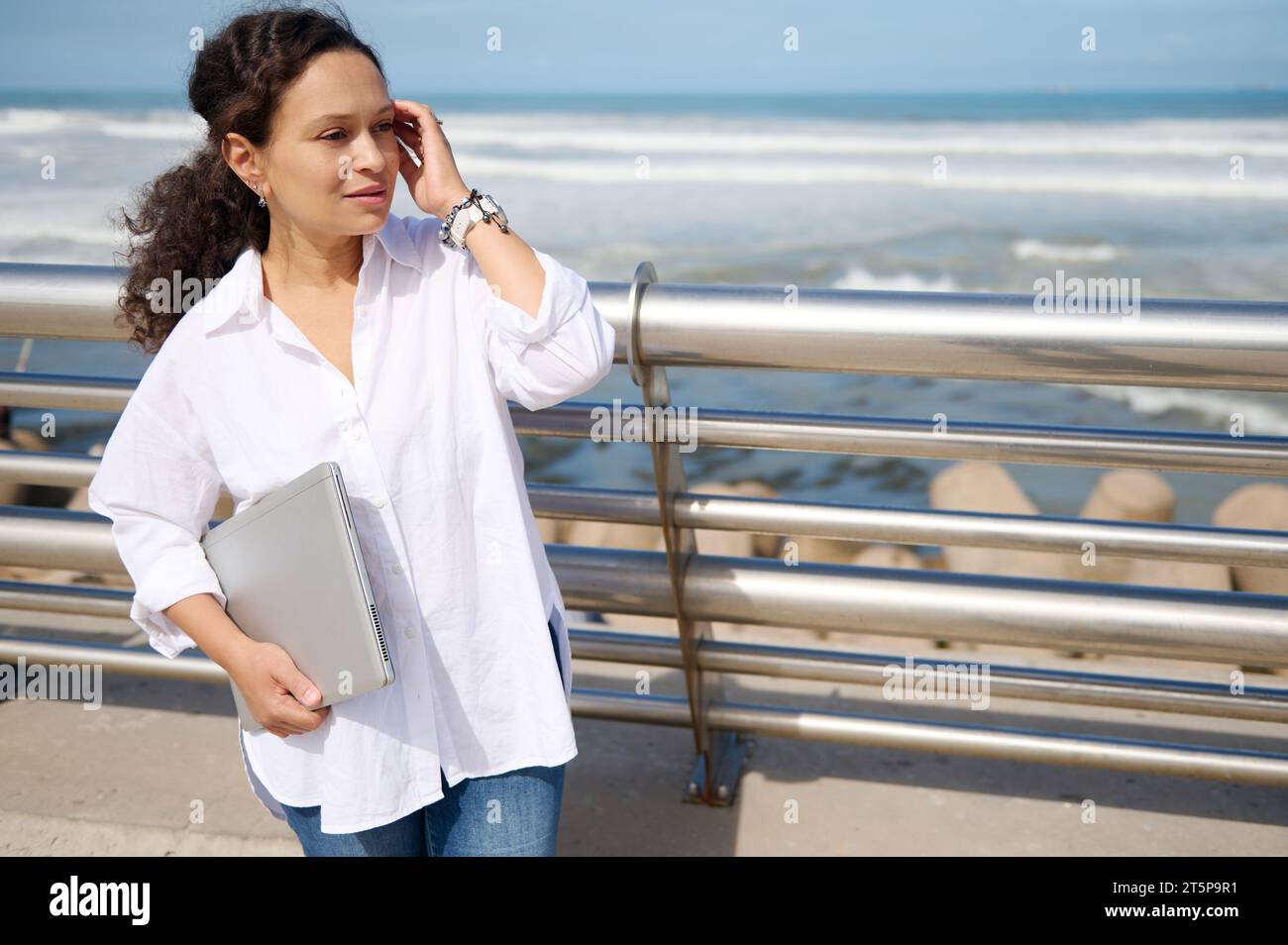 Charming multi ethnic young adult woman, business person wearing white ...
