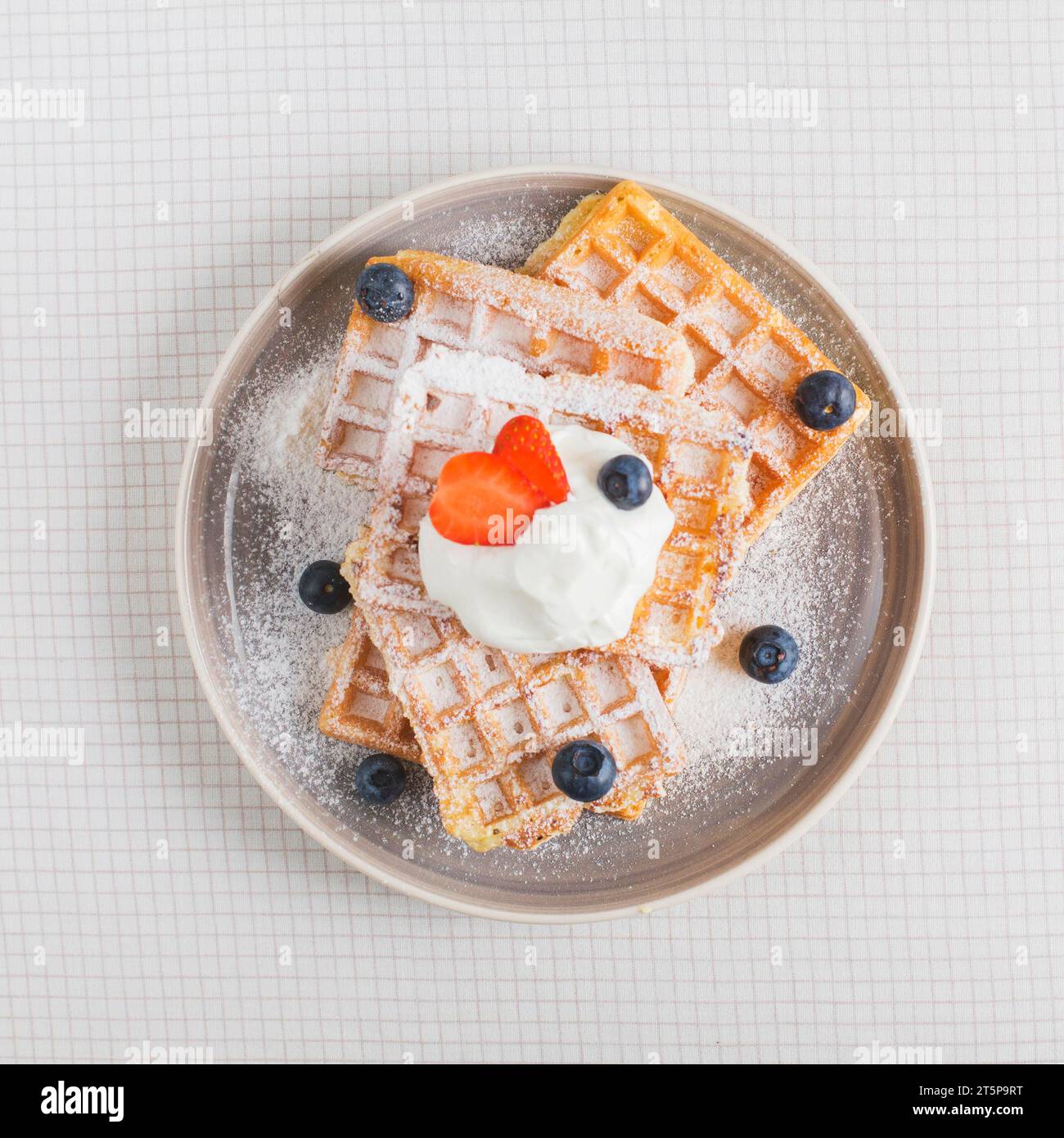 Strawberry blueberry whipped cream stack waffles plate checkered ...