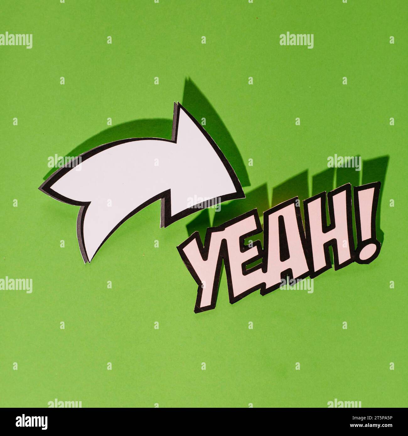 Yeah text with white arrow direction sign green background Stock Photo ...