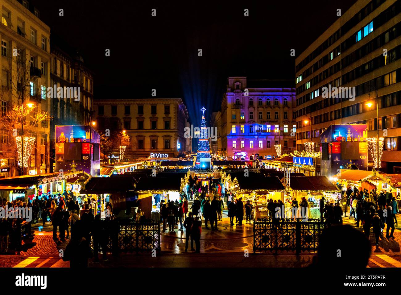 Christmas Advent fair with colorful lights in the square in front of ...