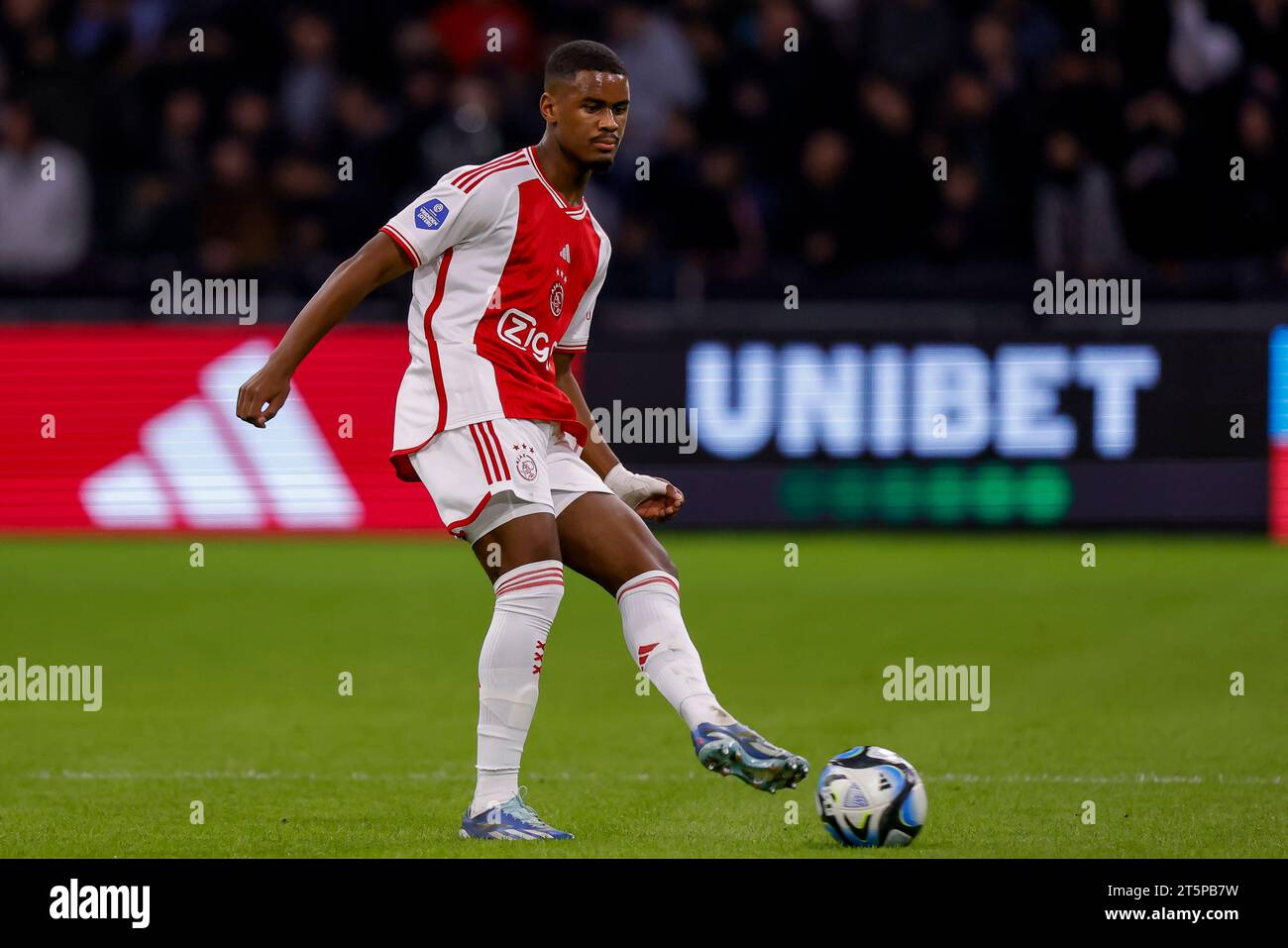 AMSTERDAM, NETHERLANDS - NOVEMBER 5: Jorrel Hato (Ajax) Controls the ball during the Eredivisie ...