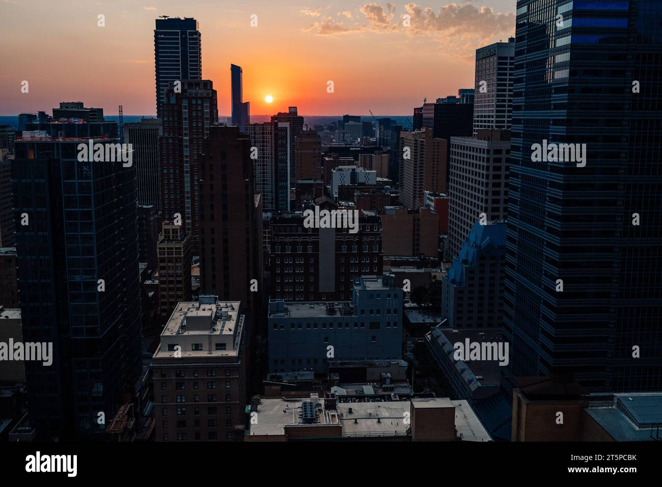 Aerial view over center city neighborhoods and streets of Philadelphia ...