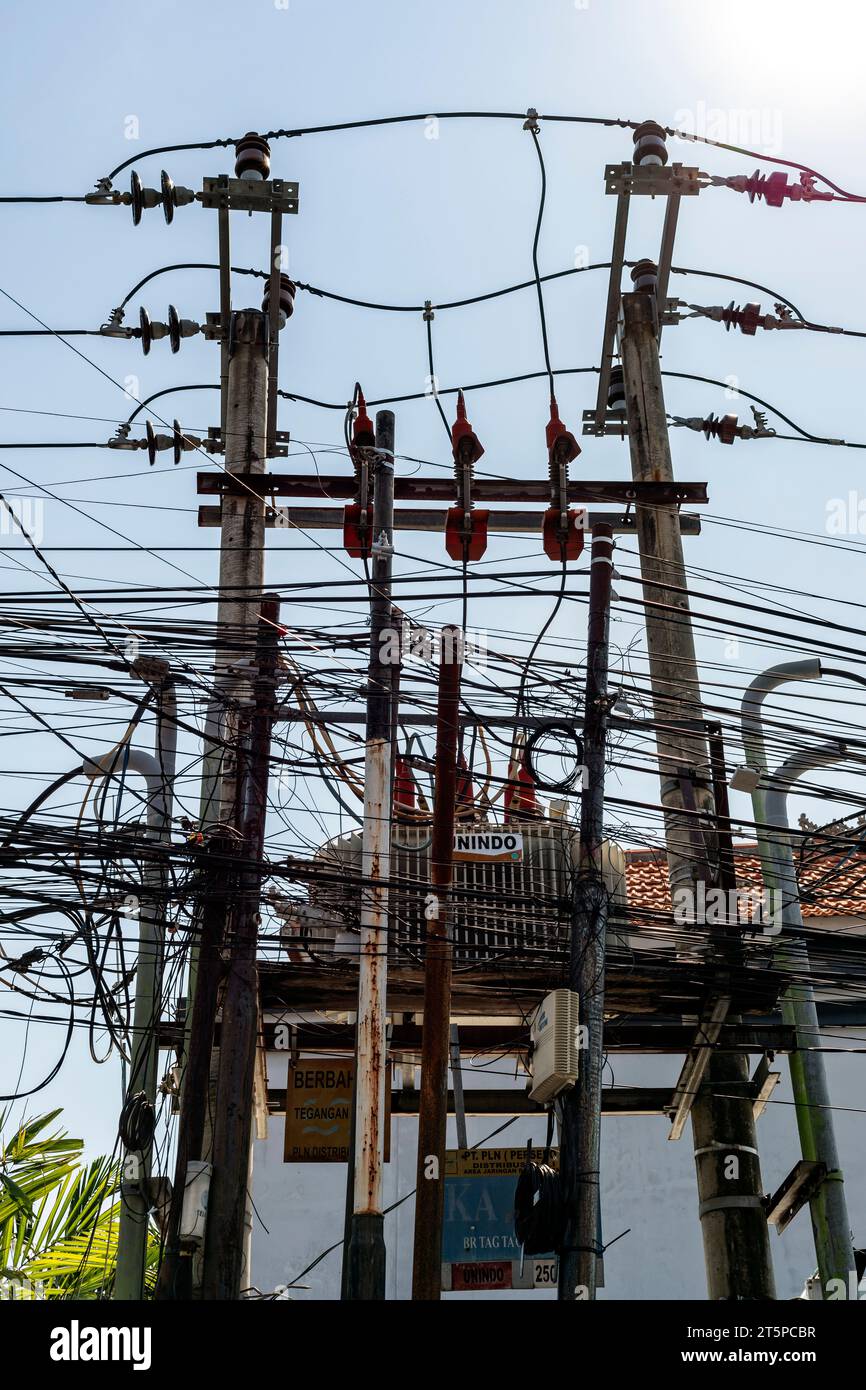 Electric and telephone cables in the streets of Bali Stock Photo - Alamy
