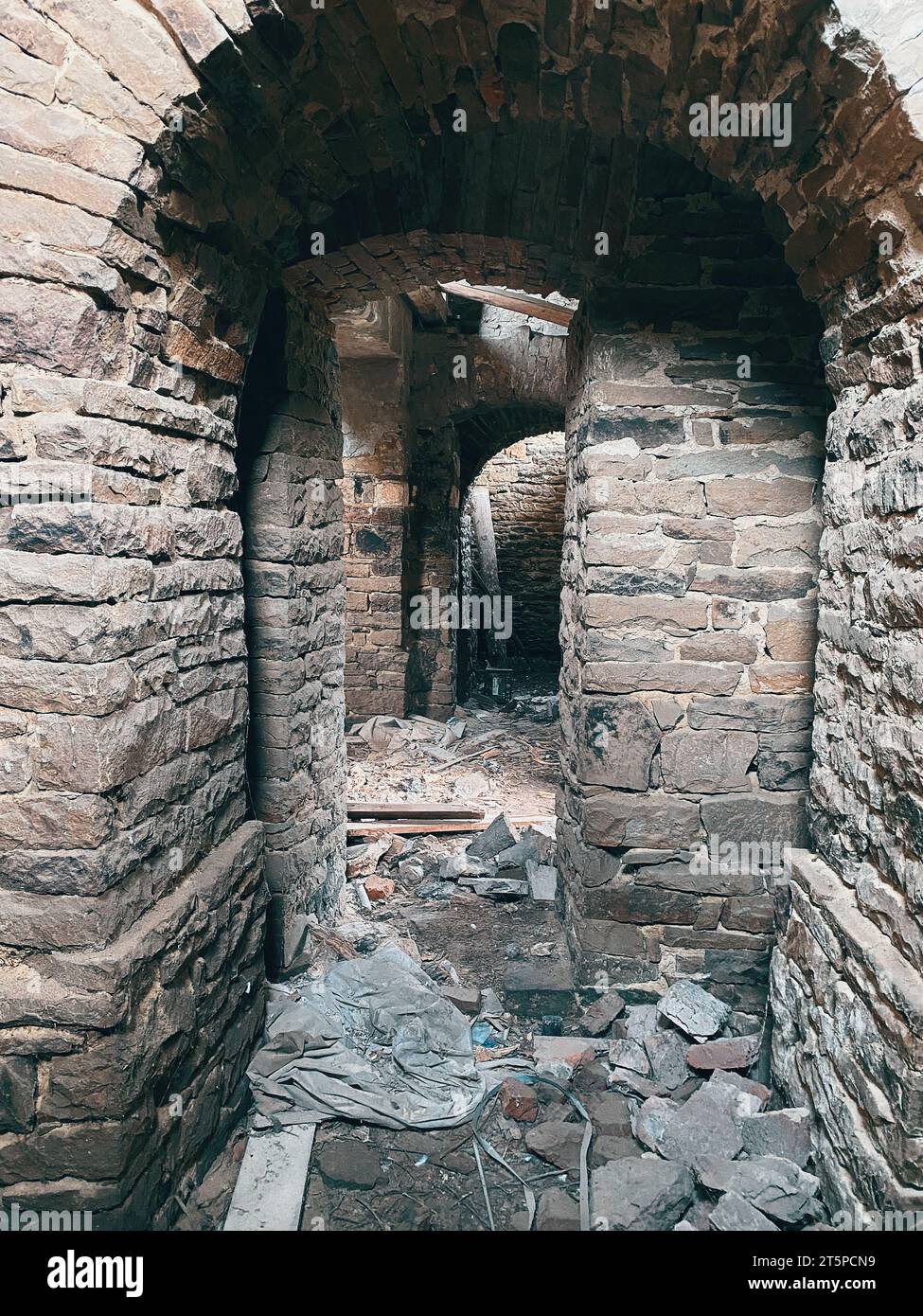 Ruined abandoned old church with stone walls. Passages, corridors. View ...