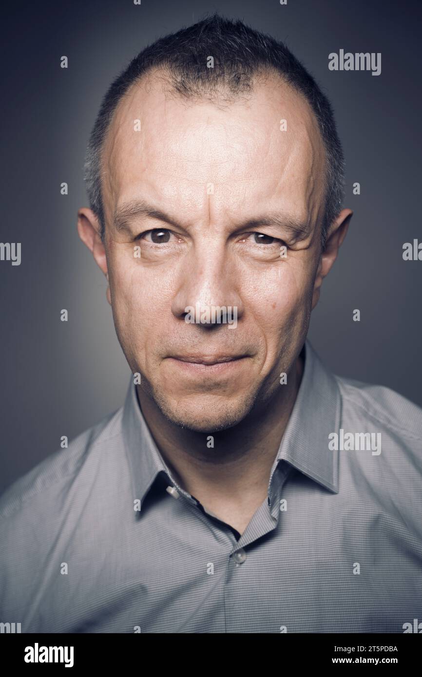 Studio shot portrait man 50s pensive expression thinking photo Stock ...