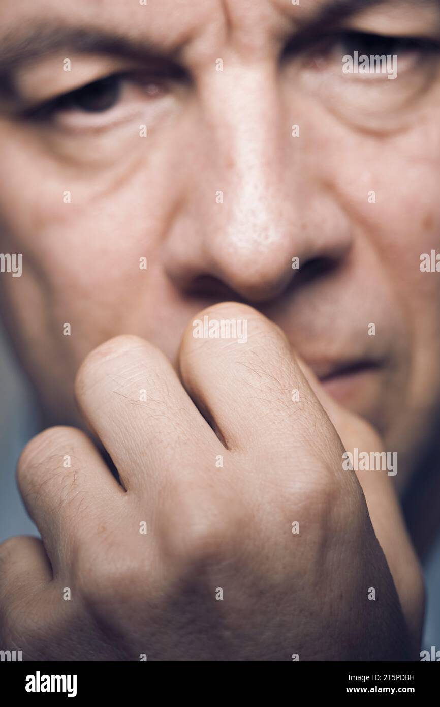 Man 50s closeup face stress feelings emotions studio shot book cover ...