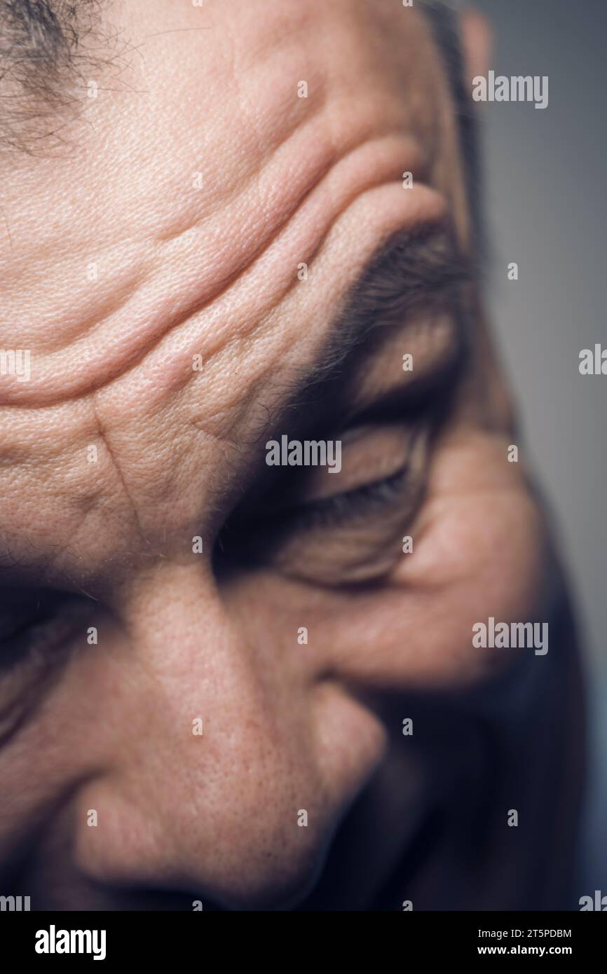 Man 50s closeup face stress feelings emotions studio shot book cover ...