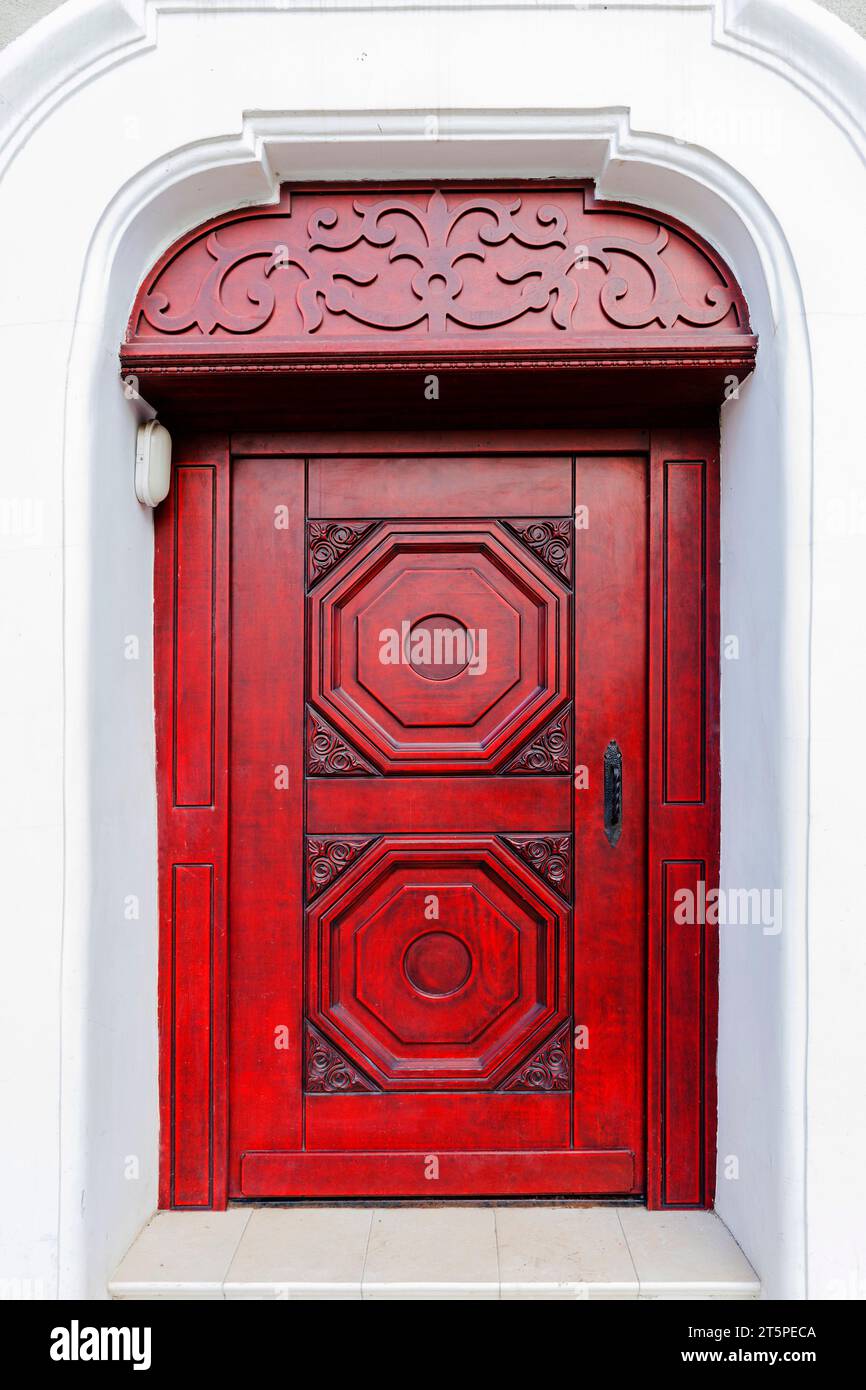 The close up image of a newly installed front door on a home. The door ...