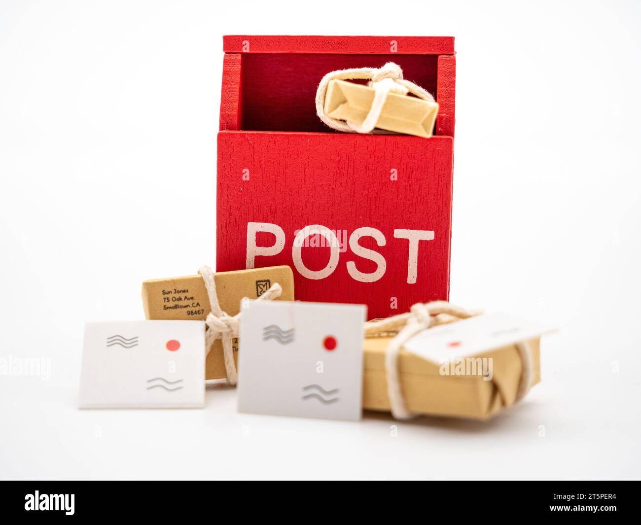 mail delivery concept, parcel boxes of different sizes, letters near a ...