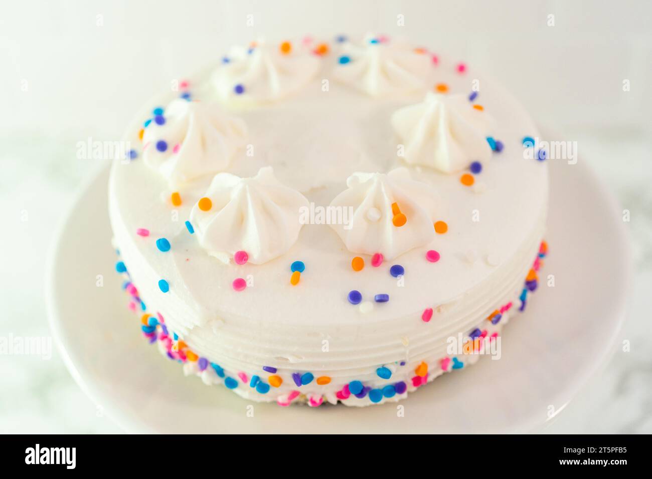 Birthday cake with funfetti sprinkles Stock Photo - Alamy