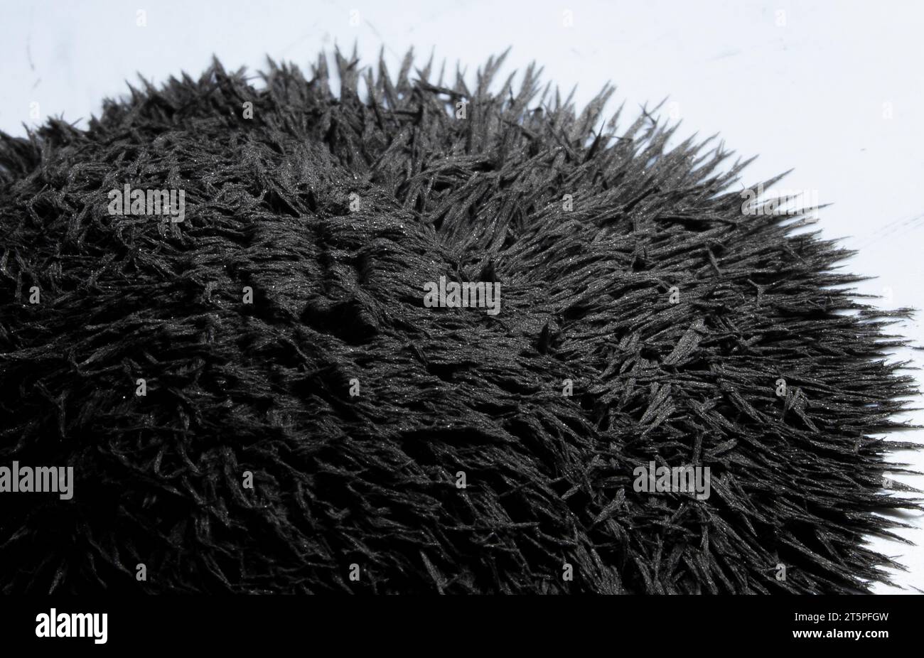 Reaction of iron dust to a strong magnet. Isolated. Visualisation of ...