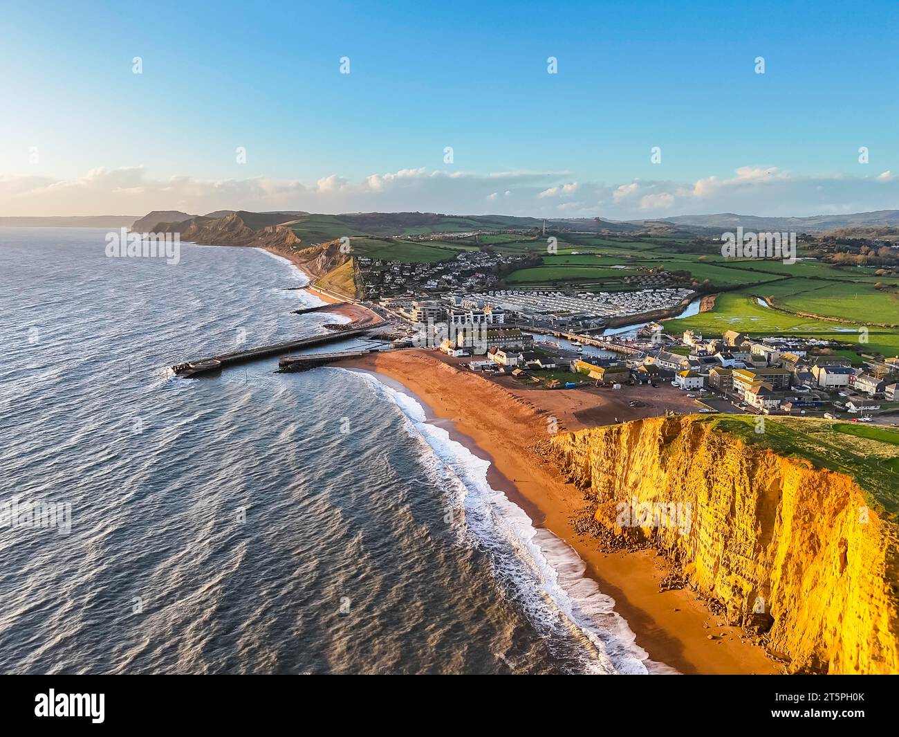 West Bay, Dorset, UK. 6th November 2023. UK Weather. Aerial view of the beach and cliffs at West ...