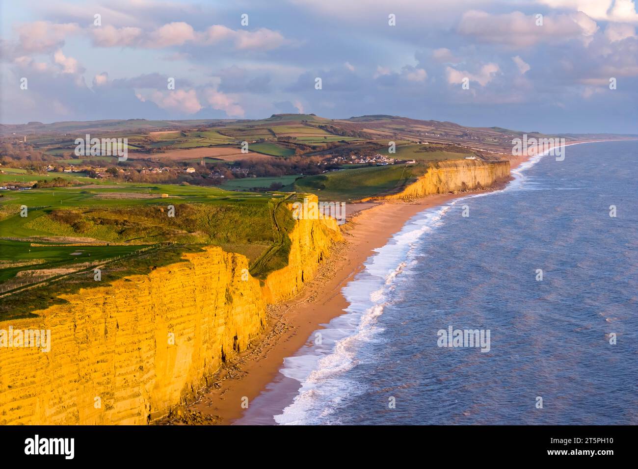 West Bay, Dorset, UK. 6th November 2023. UK Weather. Aerial view of the beach and cliffs at West ...