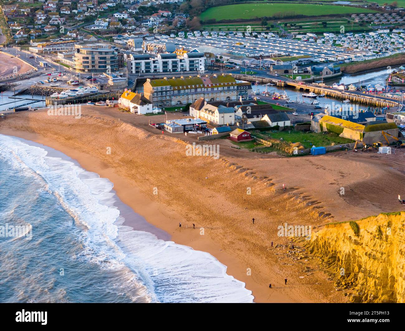 West Bay, Dorset, UK. 6th November 2023. UK Weather. Aerial view of the beach and cliffs at West ...