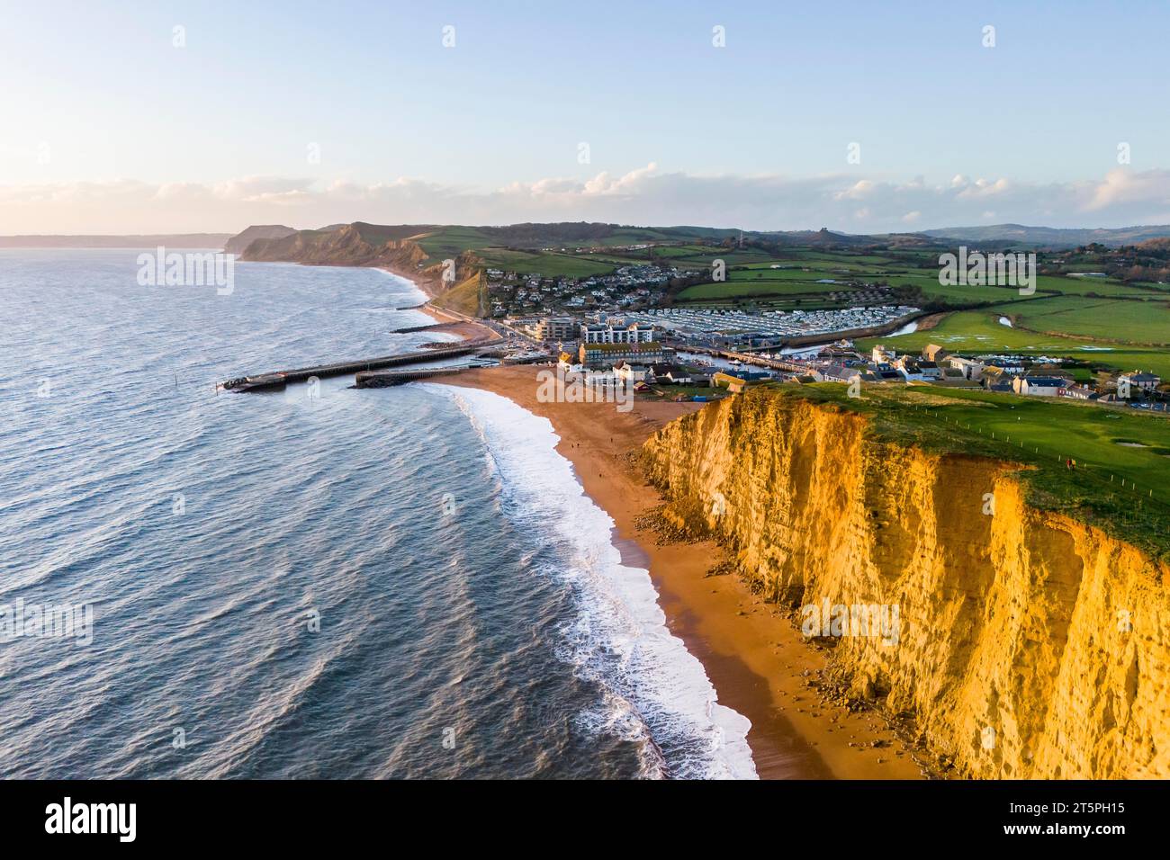 West Bay, Dorset, UK. 6th November 2023. UK Weather. Aerial view of the beach and cliffs at West ...