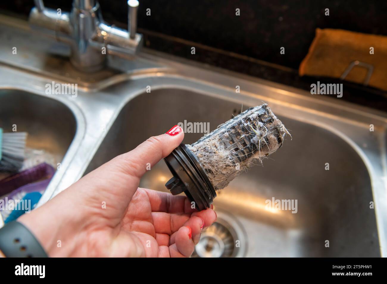 Hand washing clothes sink hi-res stock photography and images - Alamy