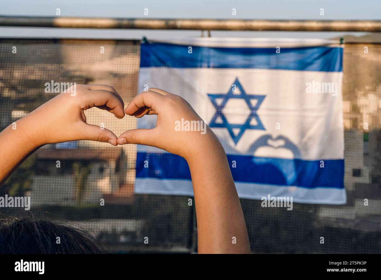 Child's Tender Hands Create a Heart Shape, Sunlight Casting Form Heart ...
