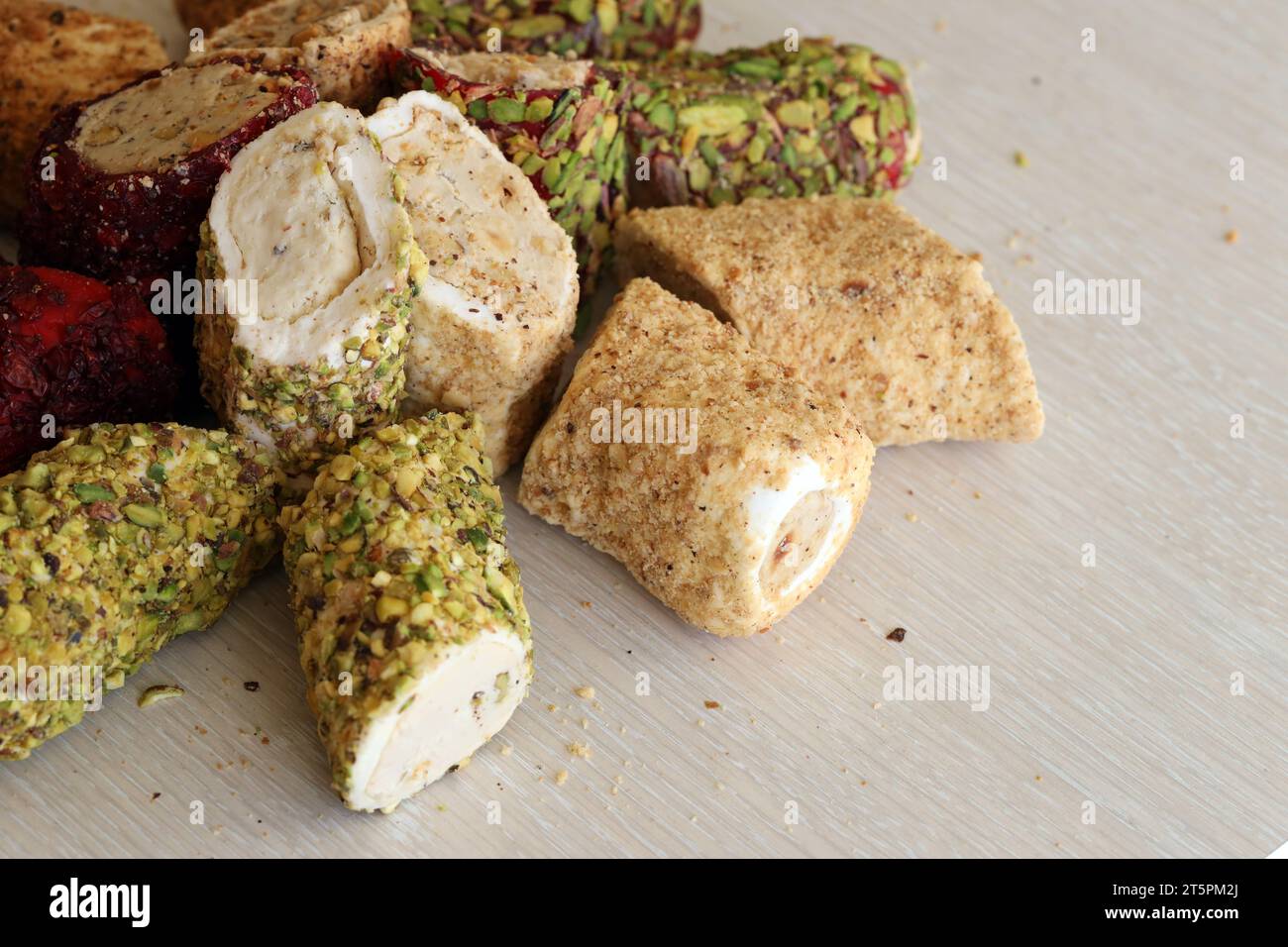 Rolls of turkish delight with different flavors and fillings close up ...