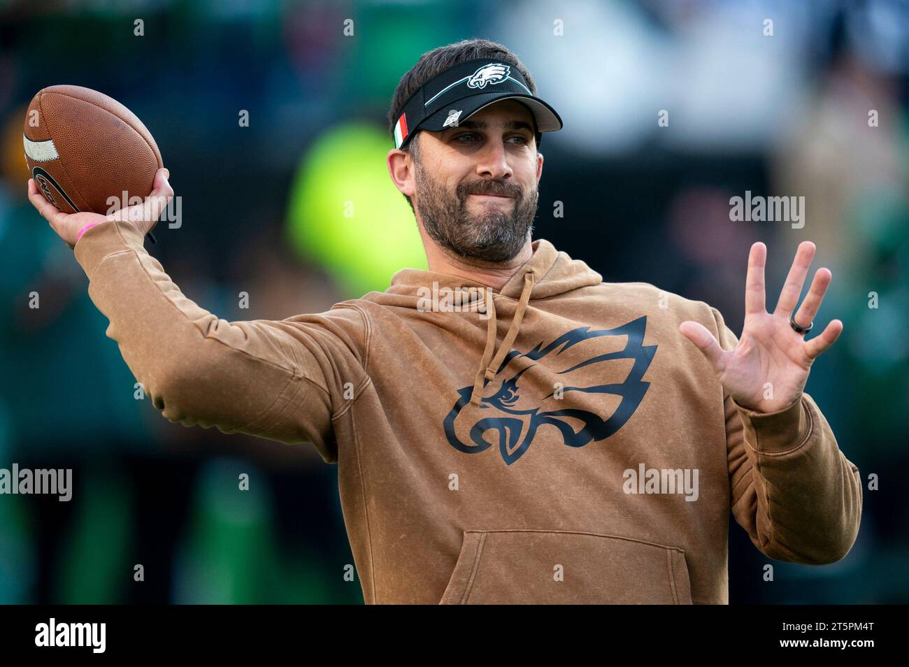 Philadelphia Eagles head coach Nick Sirianni tosses the ball around ...