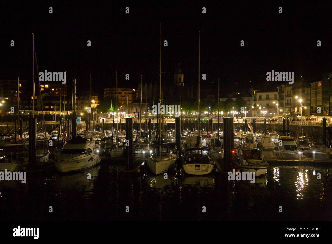 Lekeitio town night view from pier. Basque autonomous community, Spain ...