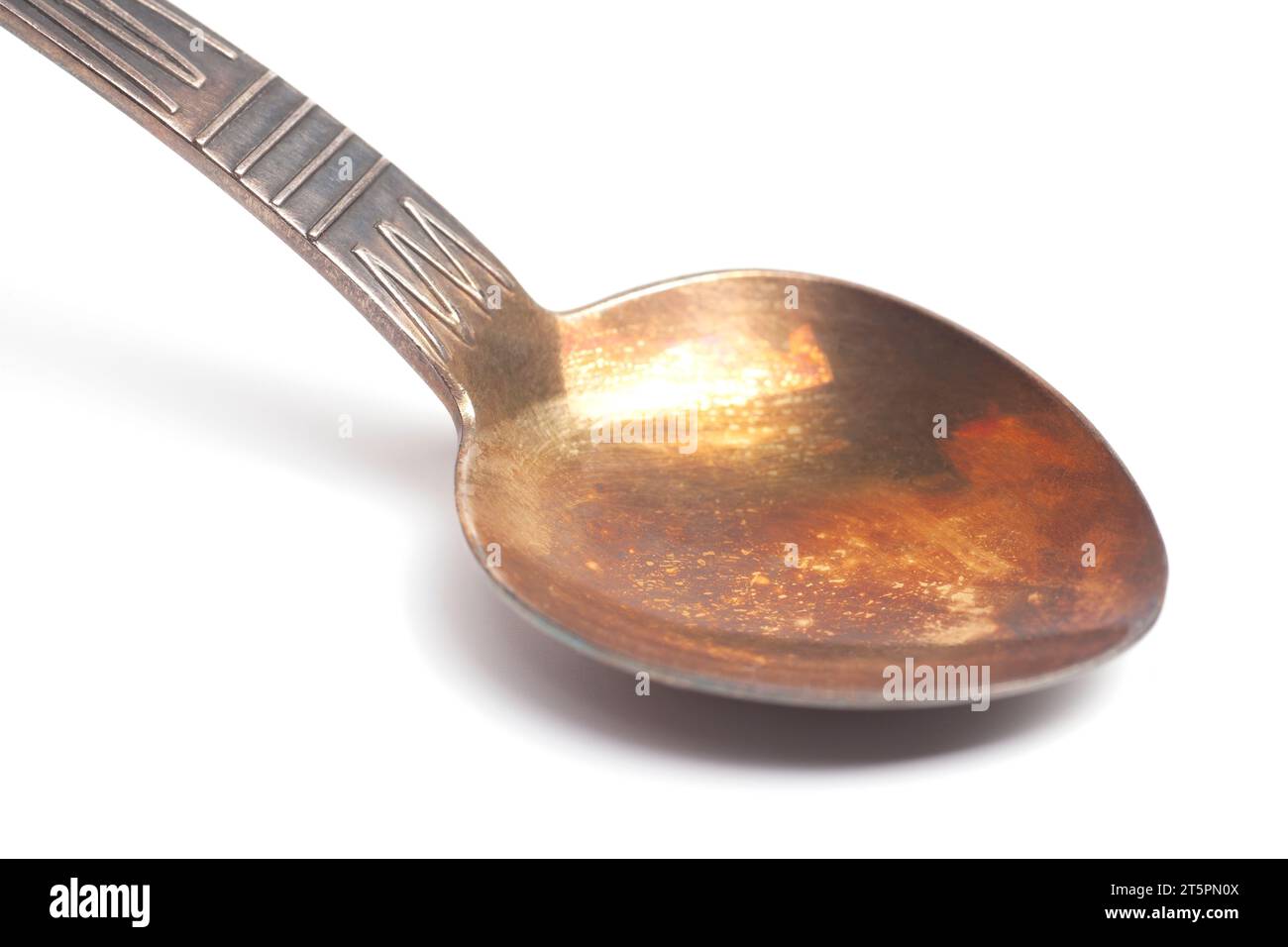 Old teaspoon isolated on white background Stock Photo - Alamy