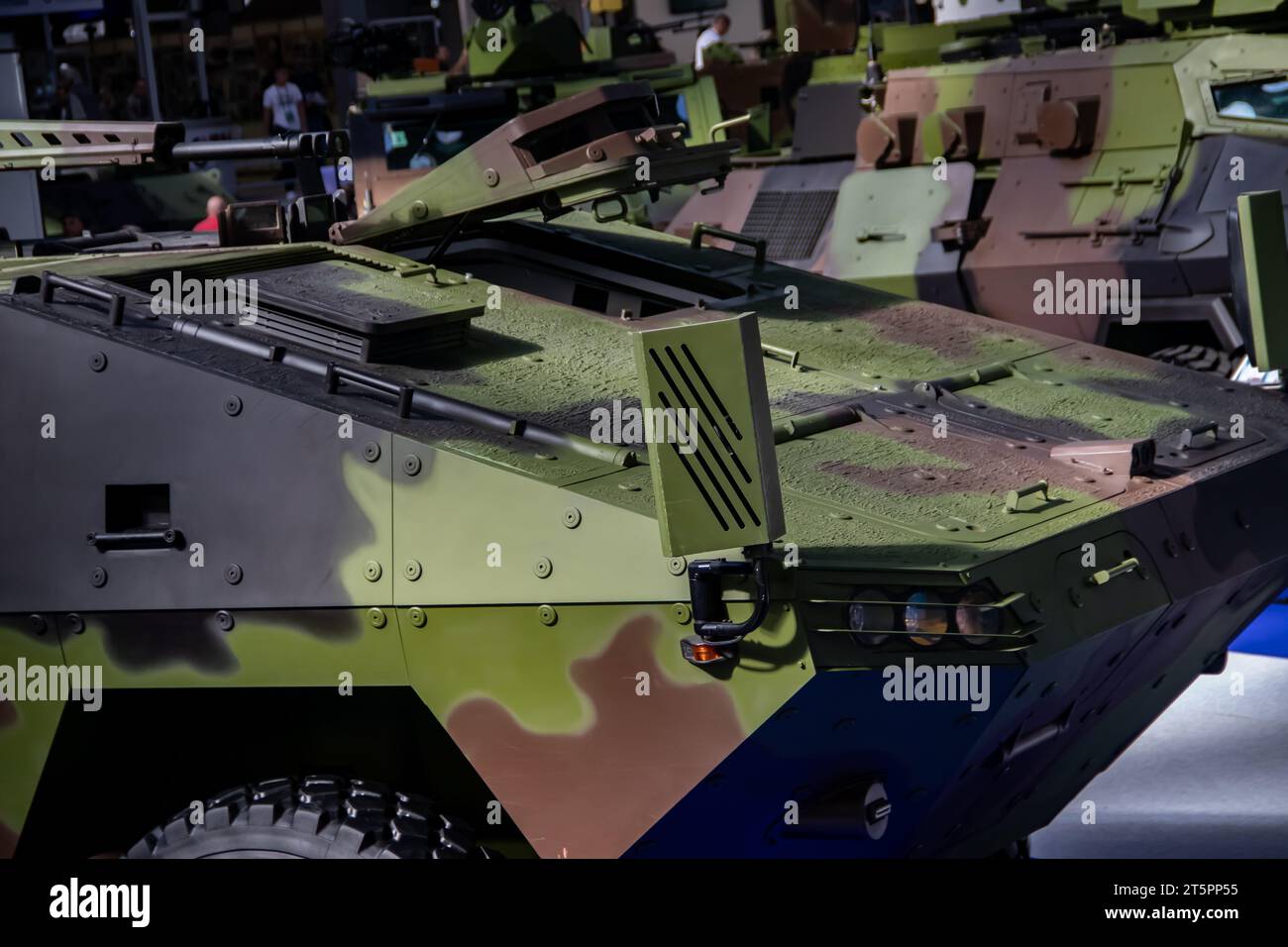 Armored combat vehicle painted in camouflage colors, armed with lethal ...