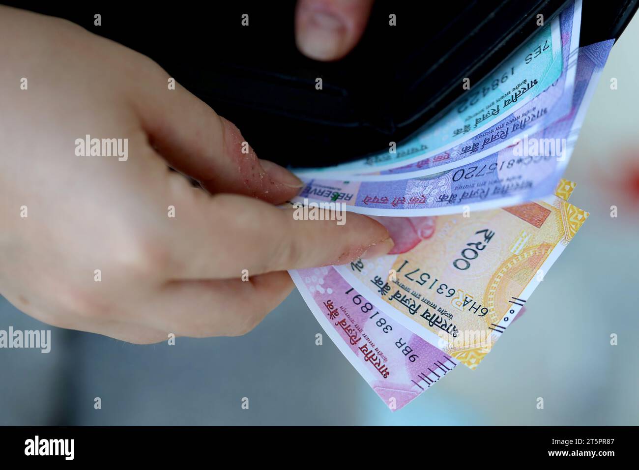 Woman hand with indian rupees bills close up. Concept of financial ...