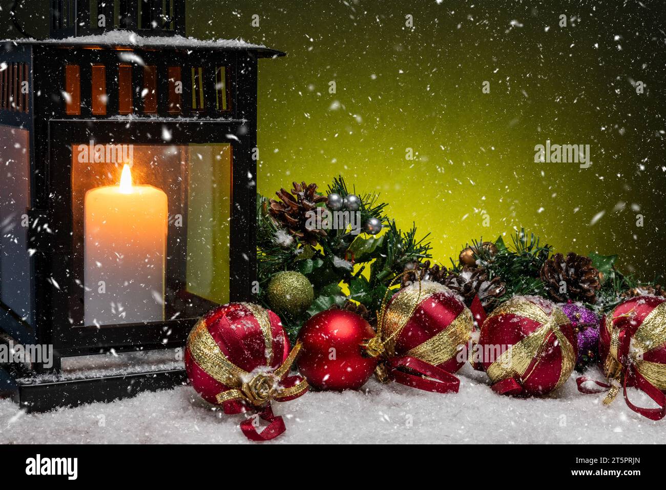christmas still life scene with falling snow Stock Photo - Alamy