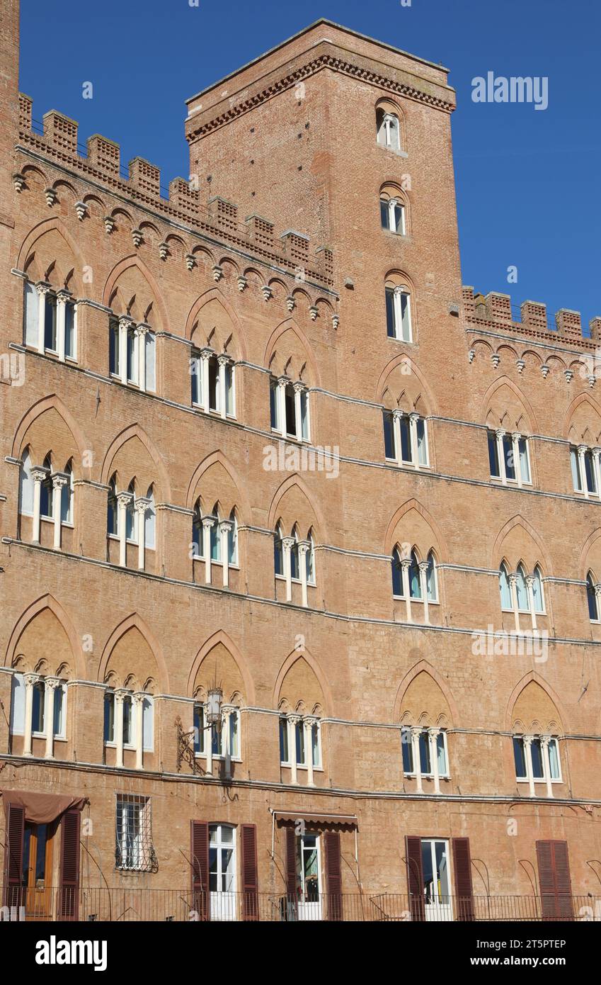 Siena, SI, Italy - February 20, 2023: ancient medieval palace with ...