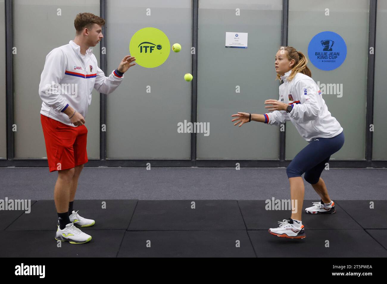 Marie Bouzkova of Czech Republic, right, and coach Antonin Bolardt ...