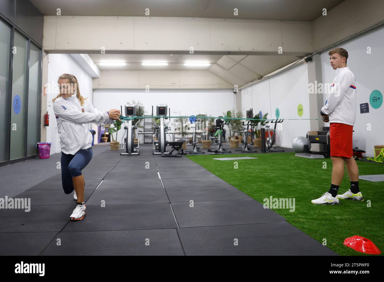Marie Bouzkova of Czech Republic, left, and coach Antonin Bolardt ...