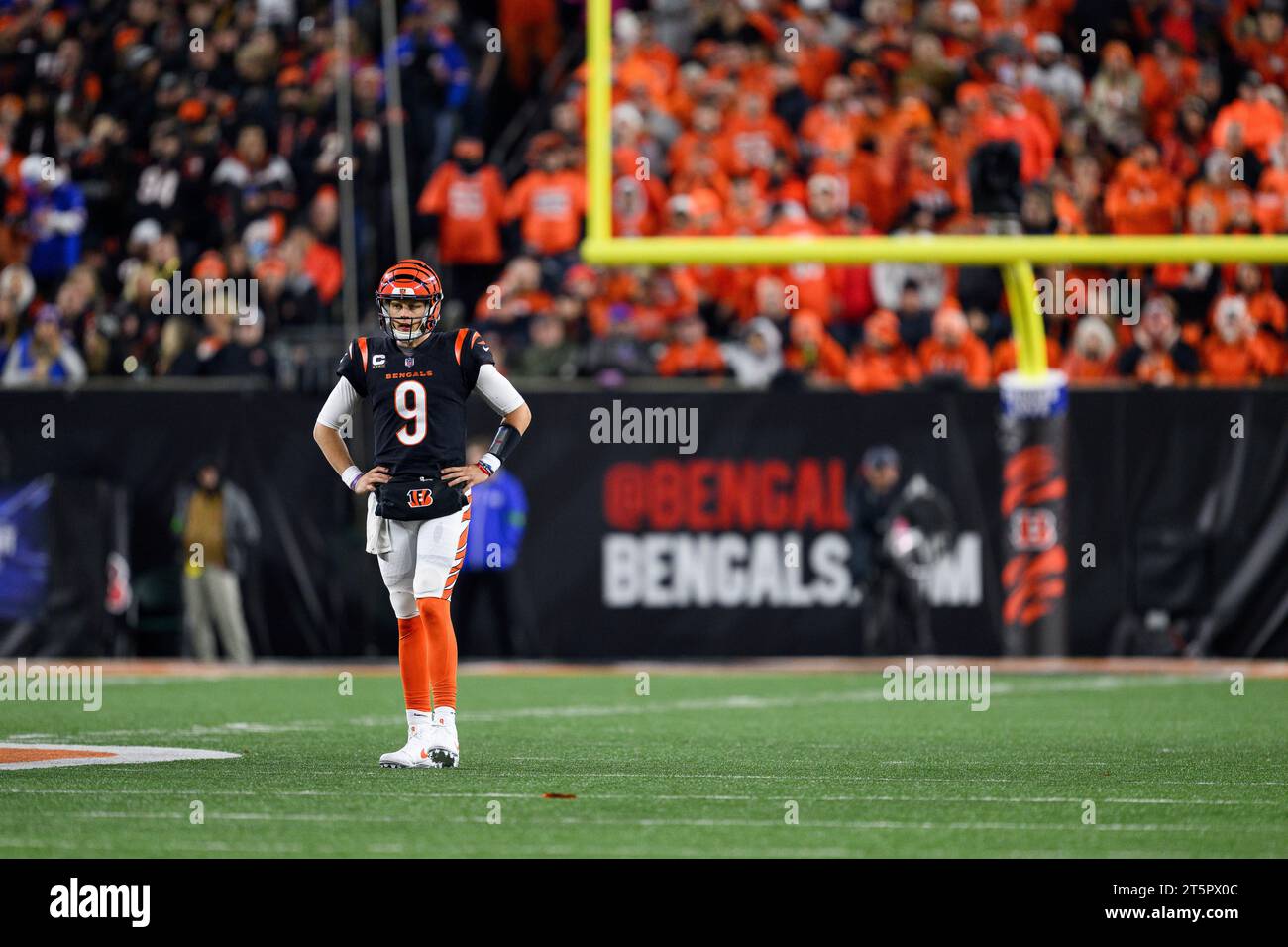 Cincinnati Bengals quarterback Joe Burrow (9) walks to the huddle ...