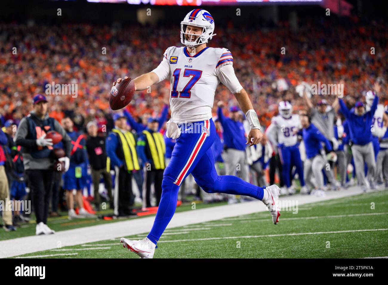 Buffalo Bills quarterback Josh Allen (17) scrambles down the field for ...