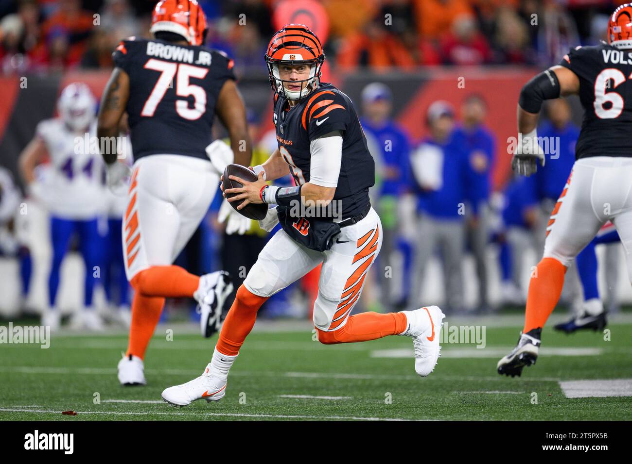 Cincinnati Bengals quarterback Joe Burrow (9) scrambles from pressure ...
