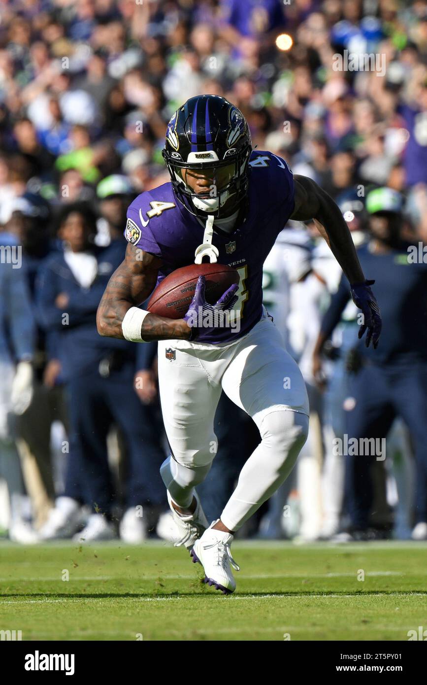 Baltimore Ravens wide receiver Zay Flowers (4) runs with the ball after ...