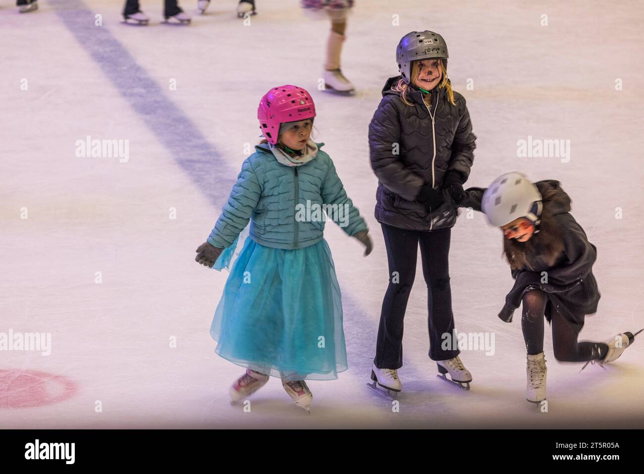Happy young girls in fancy costumes with painted faces ready for ...