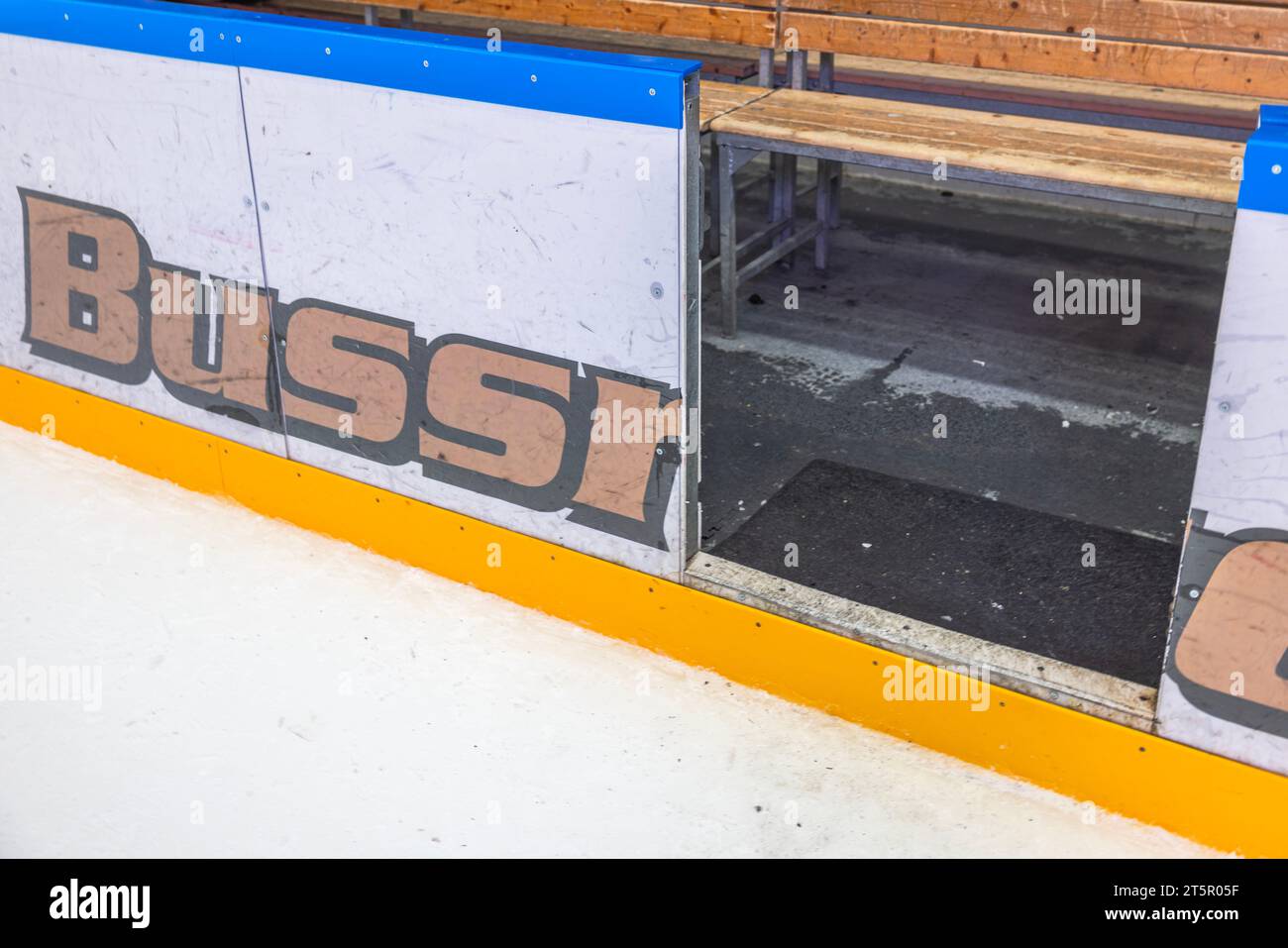 Close-up view of open gate of hockey board at ice rink in sports ...