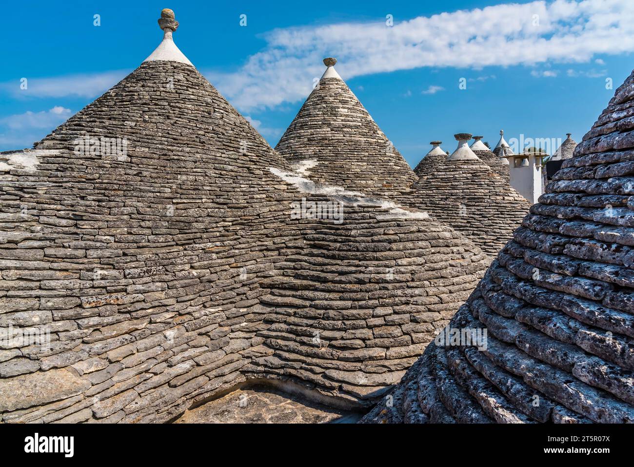 The roofs of Trulli buildings in Alberobello, Bari, Italy showing the ...