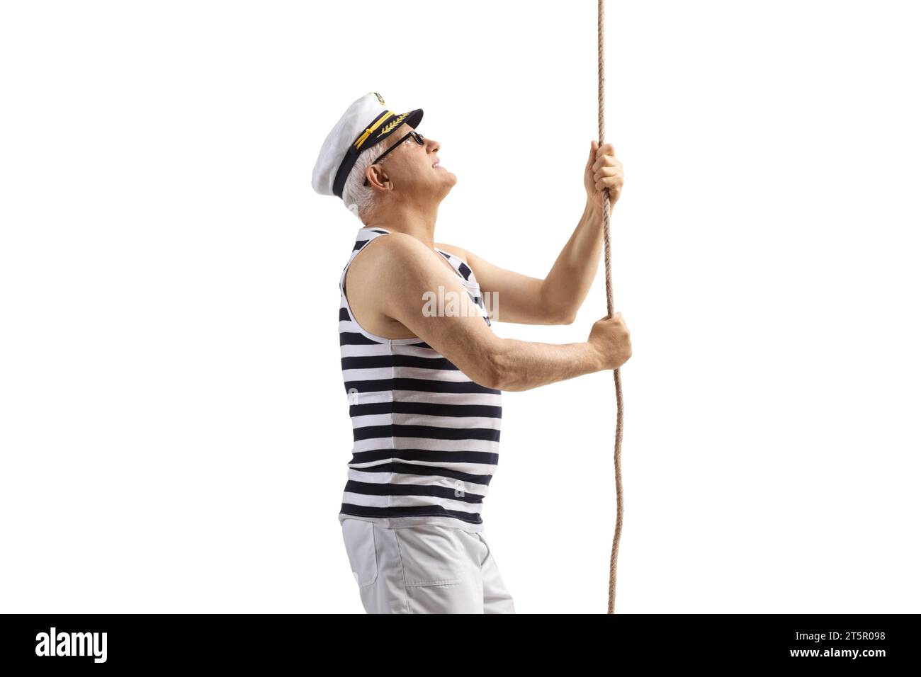 Sailor pulling a rope isolated on white background Stock Photo - Alamy
