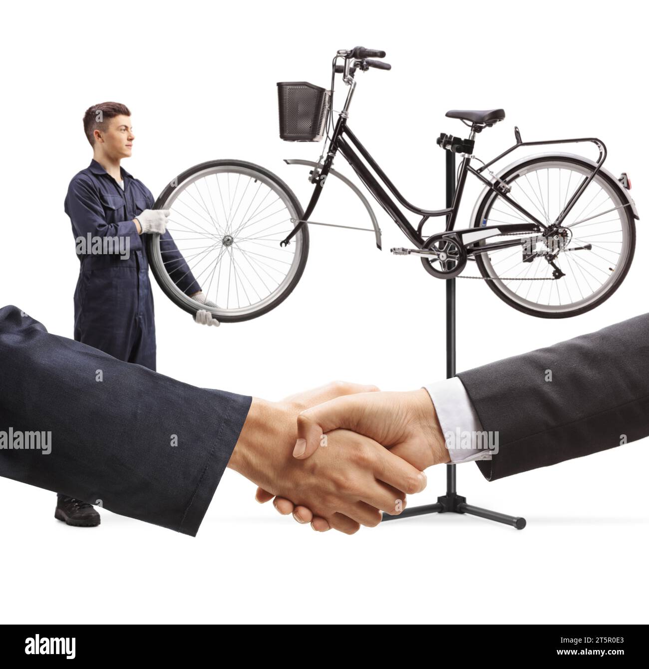 Mechanic shaking hands with a client at a bike repair workshop isolated ...