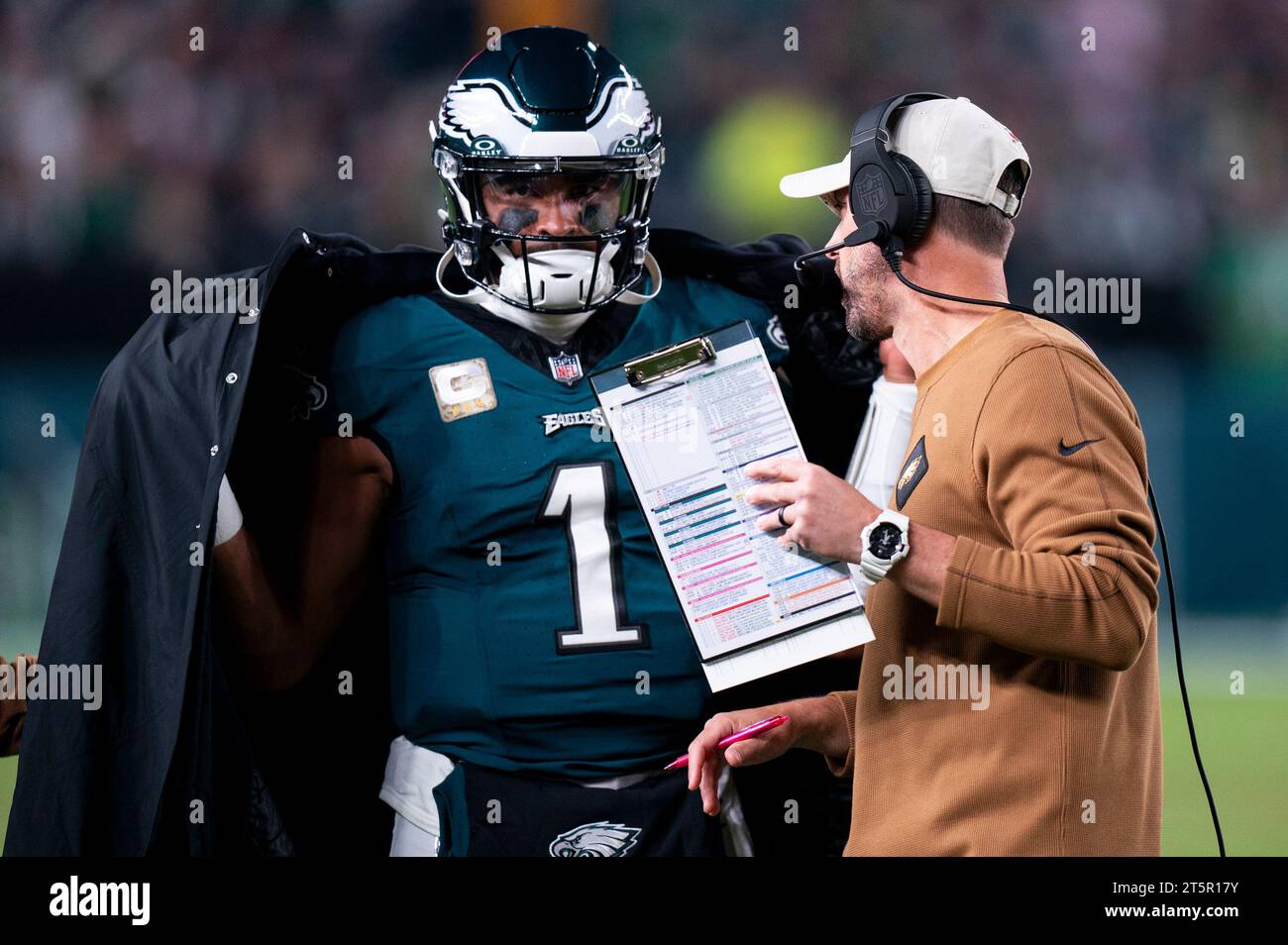 Philadelphia Eagles quarterback Jalen Hurts (1) looks on as he listens ...