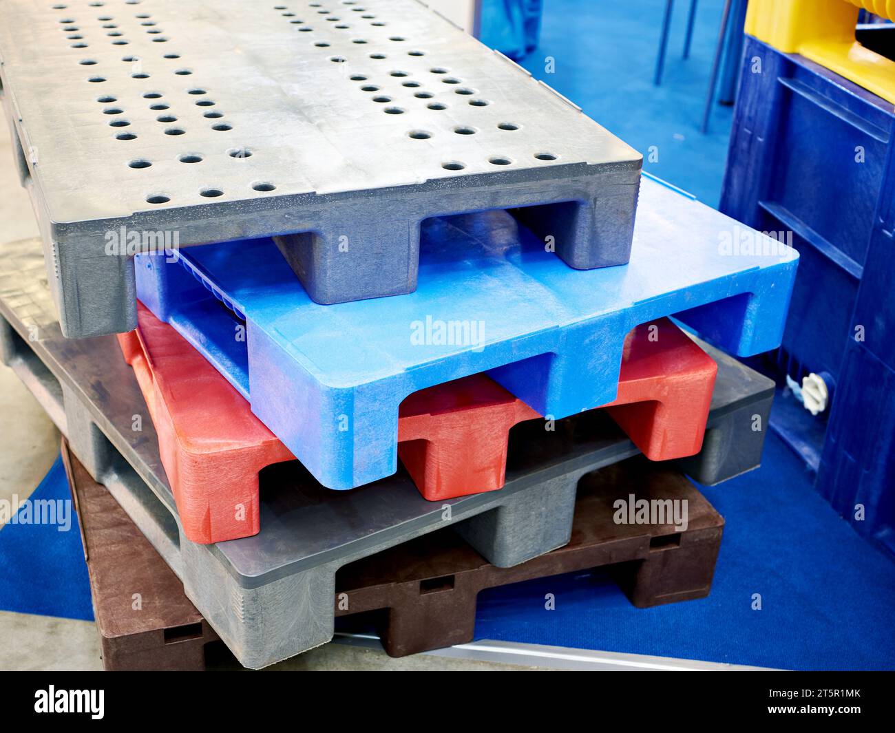 Plastic pallets at the exhibition of fishing equipment Stock Photo - Alamy