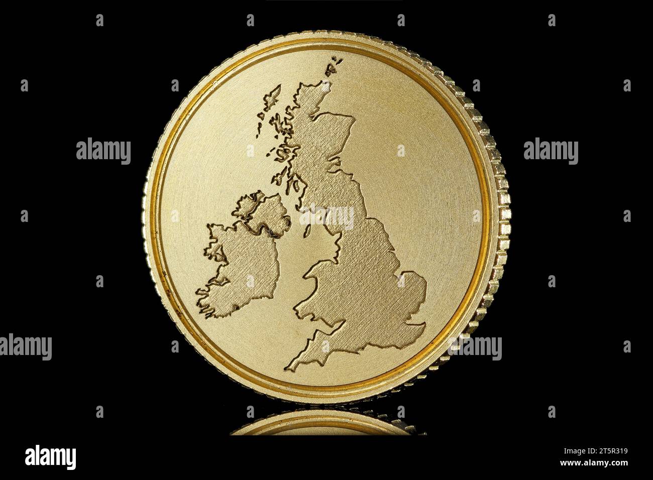 A coin with a map of the United Kingdom design etched onto both sides ...