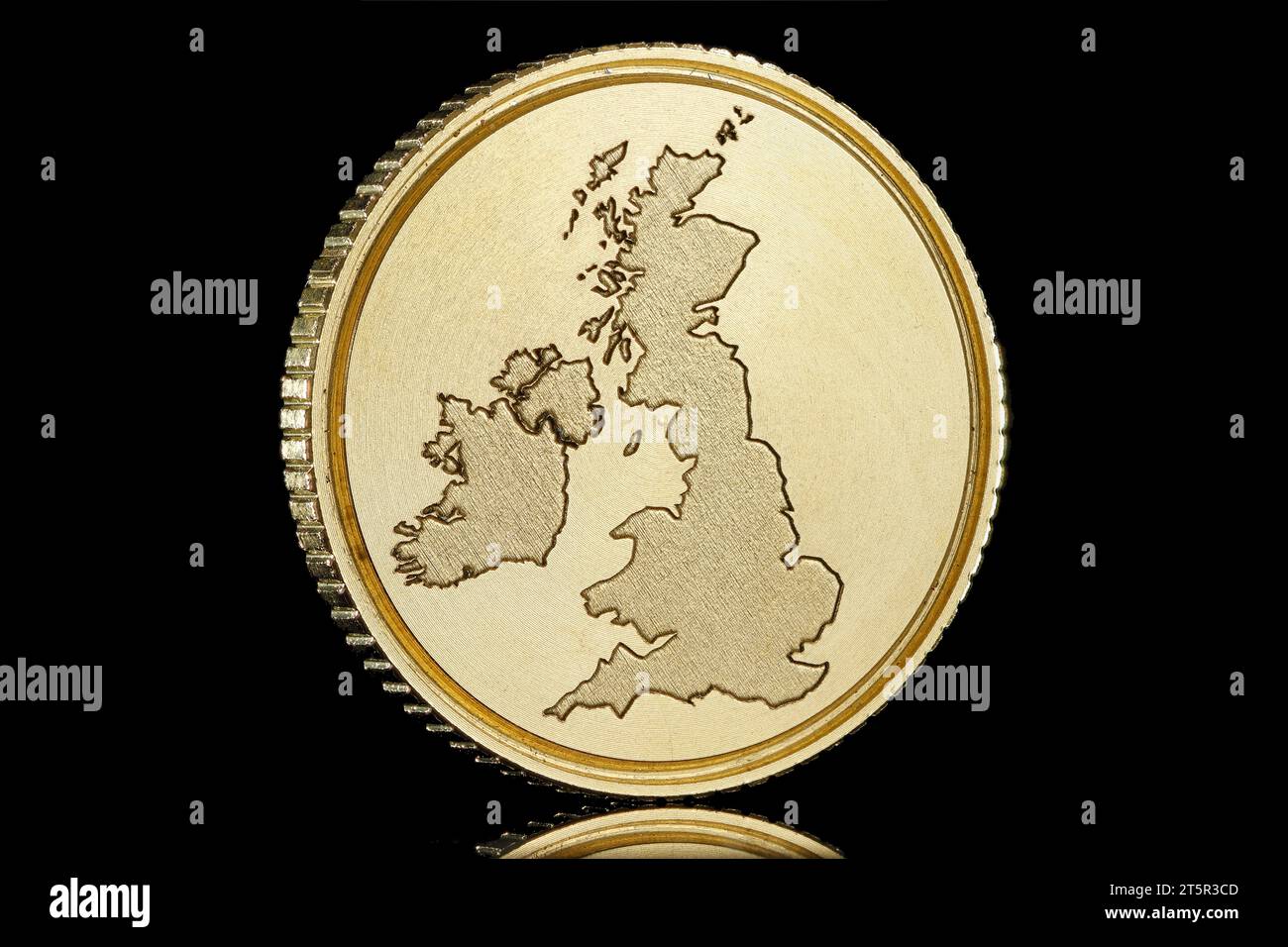 A coin with a map of the United Kingdom design etched onto both sides ...