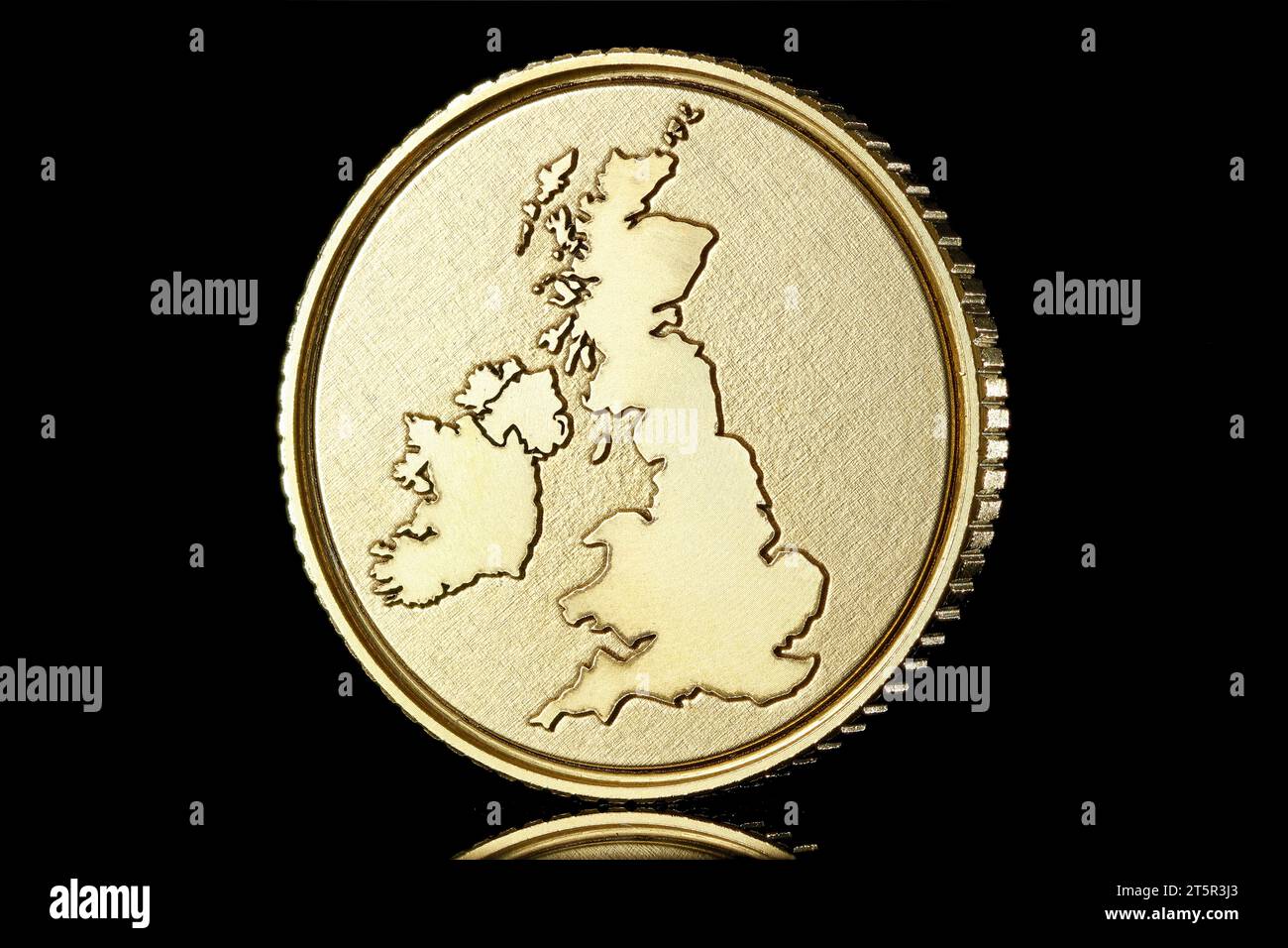 A coin with a map of the United Kingdom design etched onto both sides ...