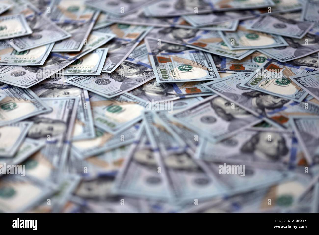 Very big amount of US hundred dollar bills close up. Huge quantity of ...